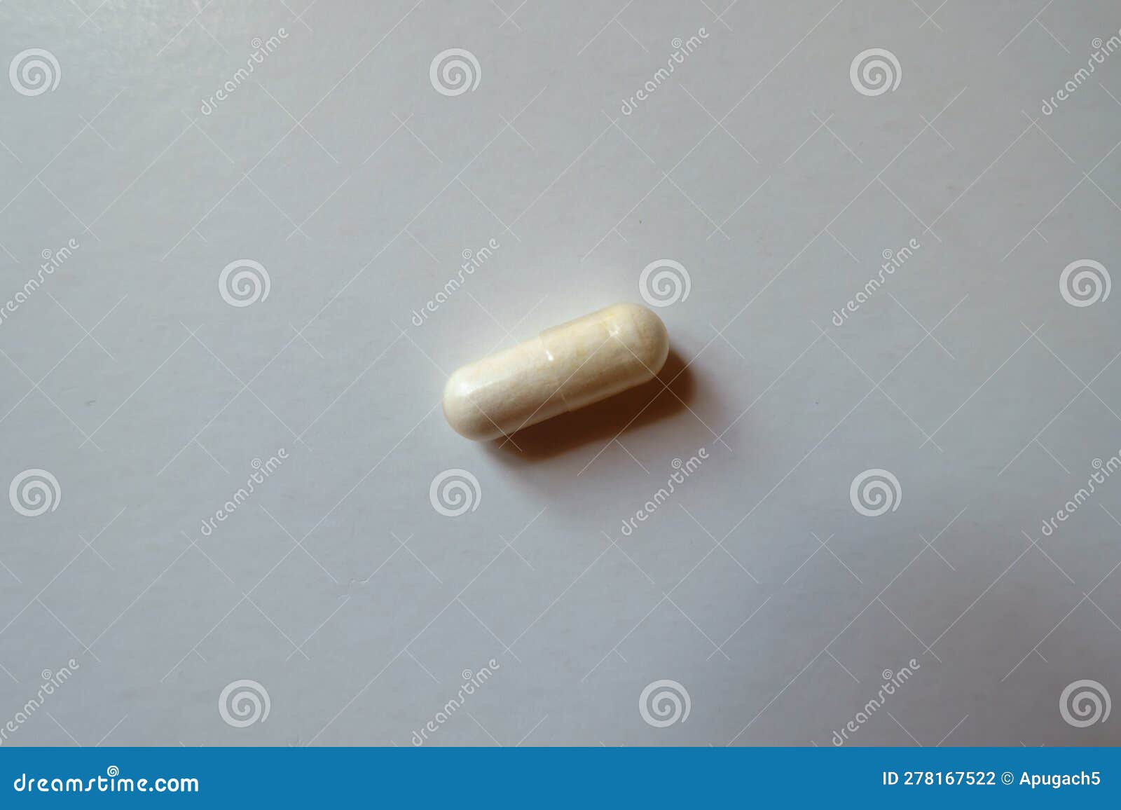 Beige Capsule of Probiotic Dietary Supplement from Above Stock Photo ...