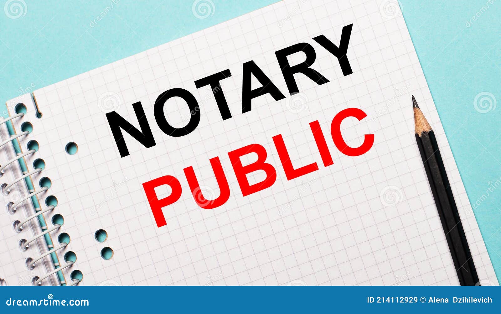 On a Light Blue Background, a Checkered Notebook with the Words NOTARY ...