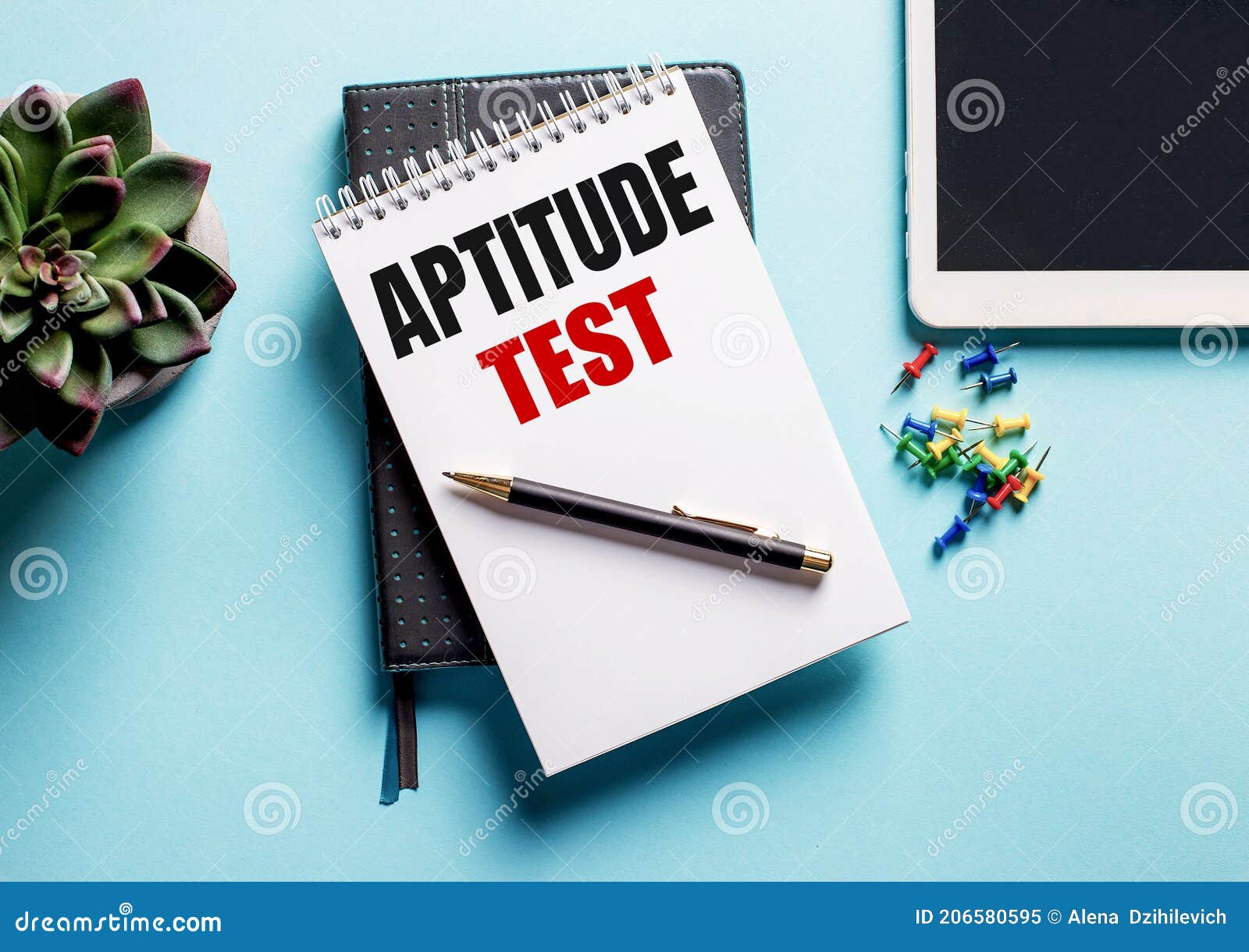 On a Light Blue Background, There is a Potted Plant, a Tablet and a ...