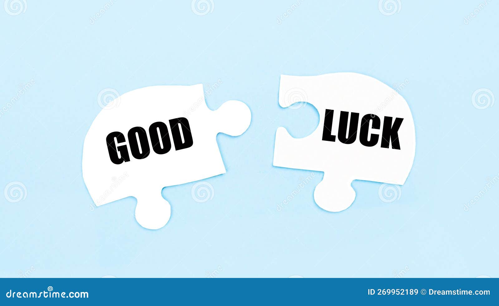 On a Light Blue Background There are Two White Puzzles with the Text ...