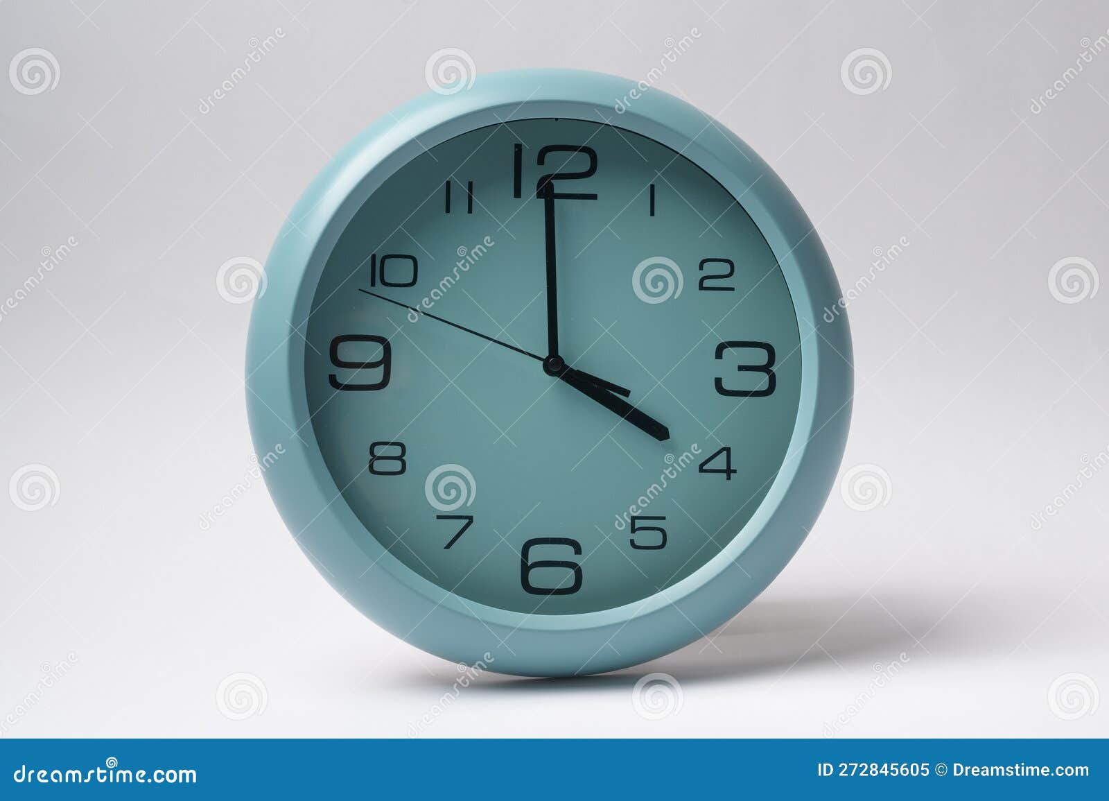 Light Blue Clock Hanging on White Wall Stock Image - Image of vintage ...
