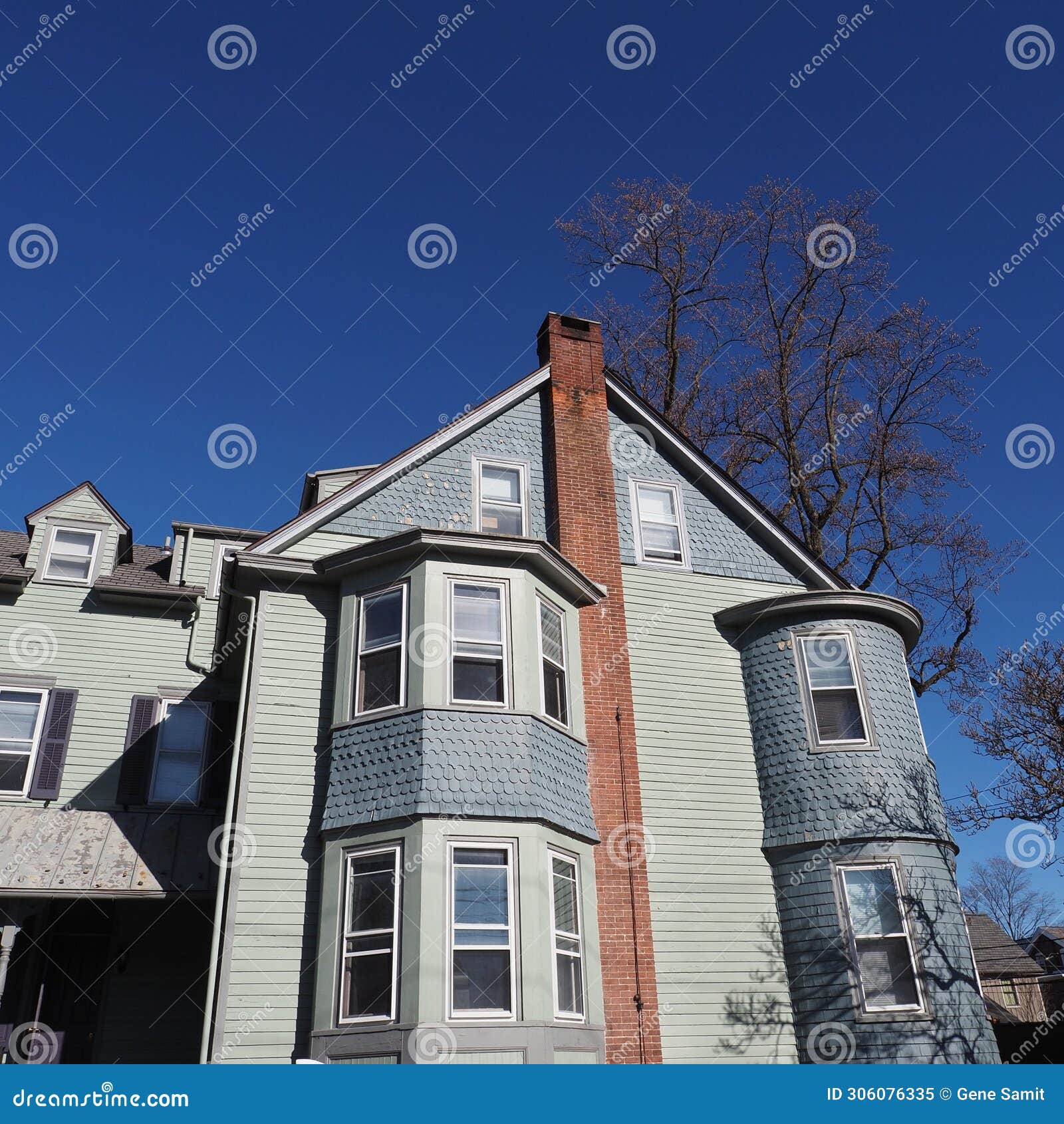 The Light Blue Color F the House Blends in with the Deep Blue Color of ...