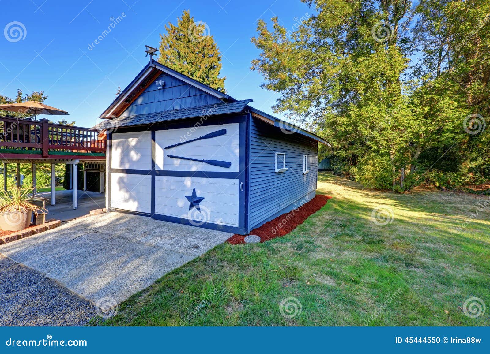 Light Blue Garage with Decorative Trim Stock Photo - Image of land ...