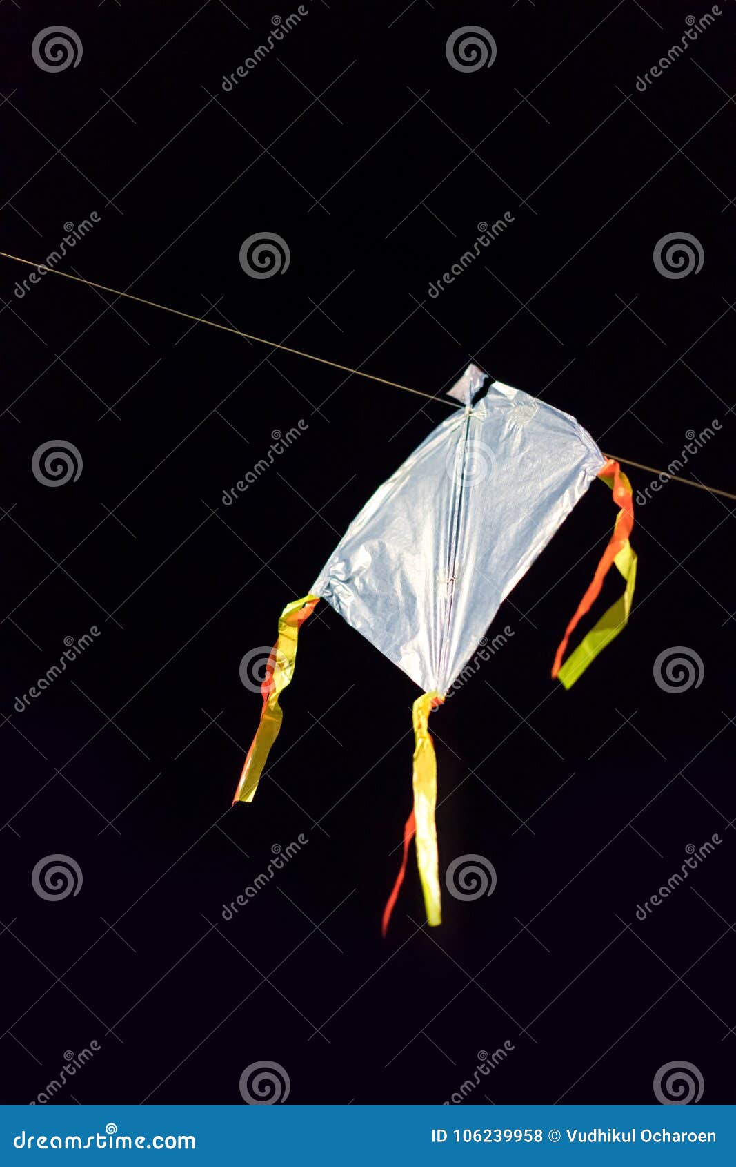 Light Blue Kite Hanging on String Isolated on Black Stock Photo - Image ...