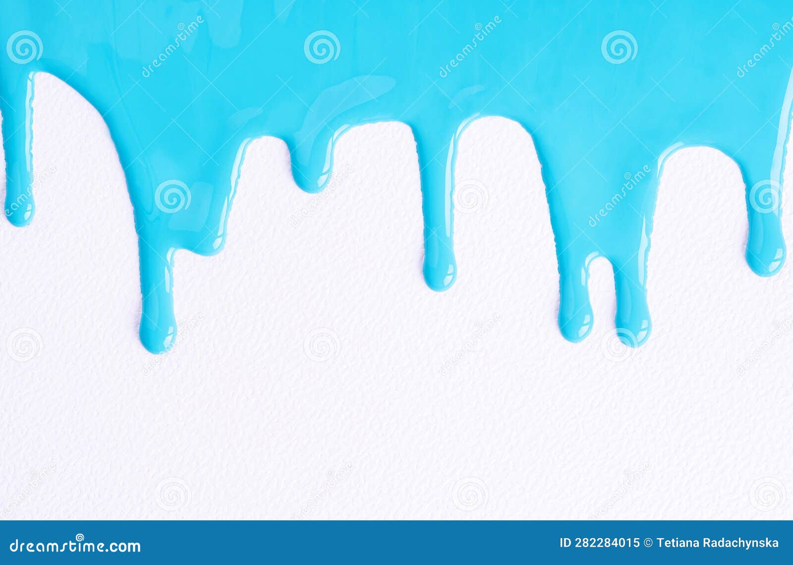 Light Blue Liquid Drops of Paint Flow Down on White Paper. Macro Photo ...