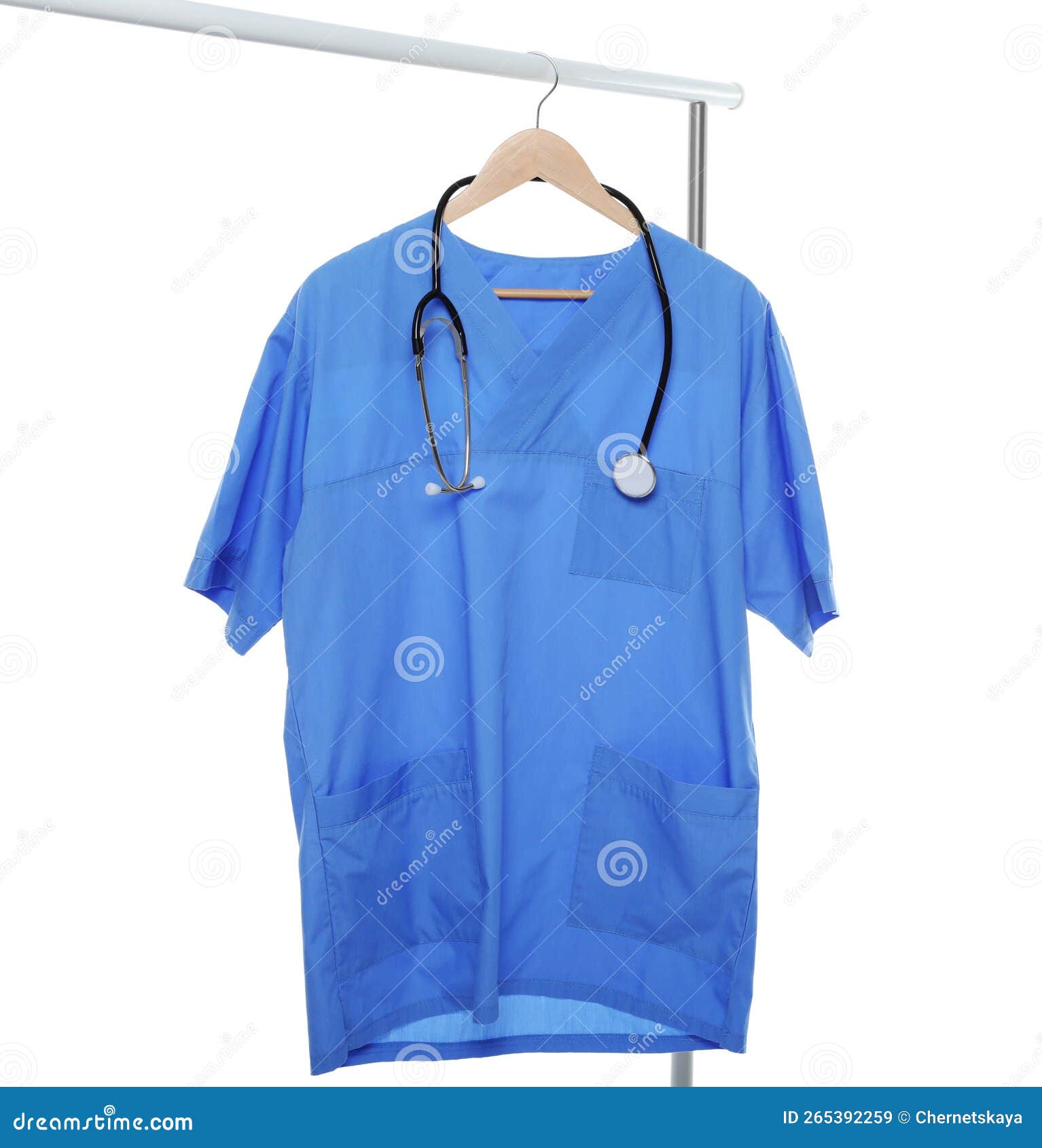 Light Blue Medical Uniform and Stethoscope on Rack Against White ...