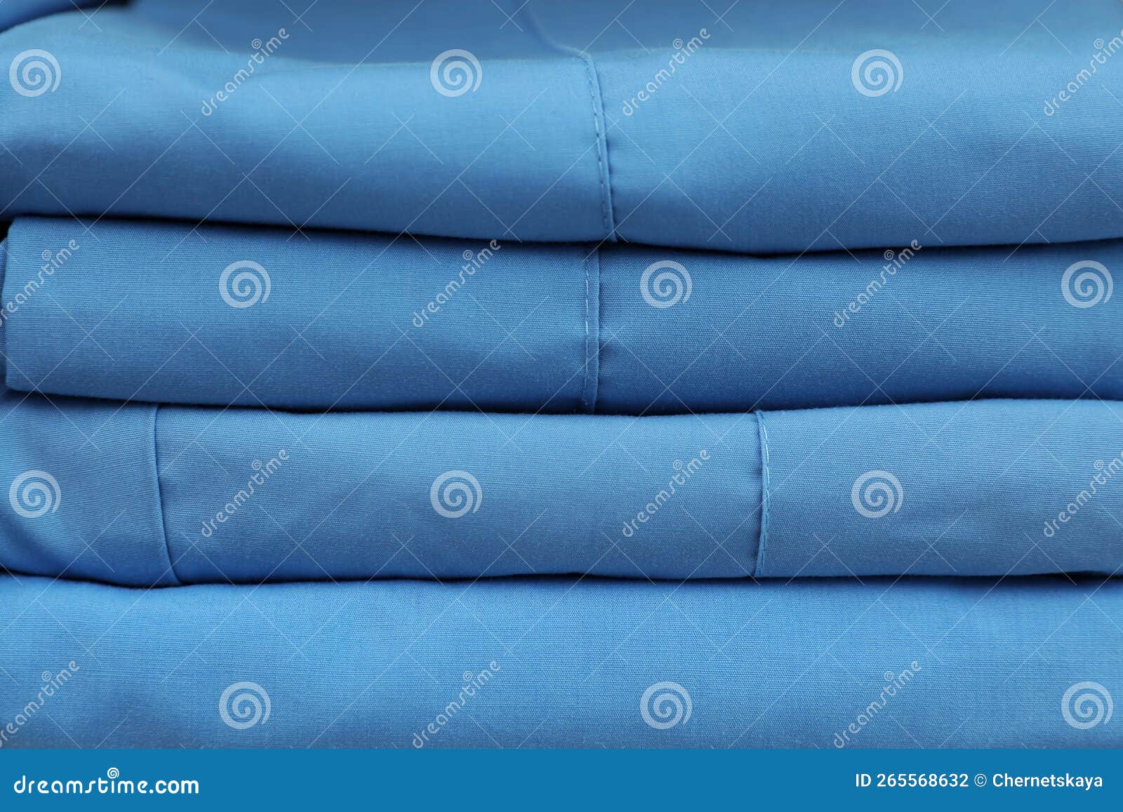 Light Blue Medical Uniforms As Background, Closeup Stock Photo - Image ...