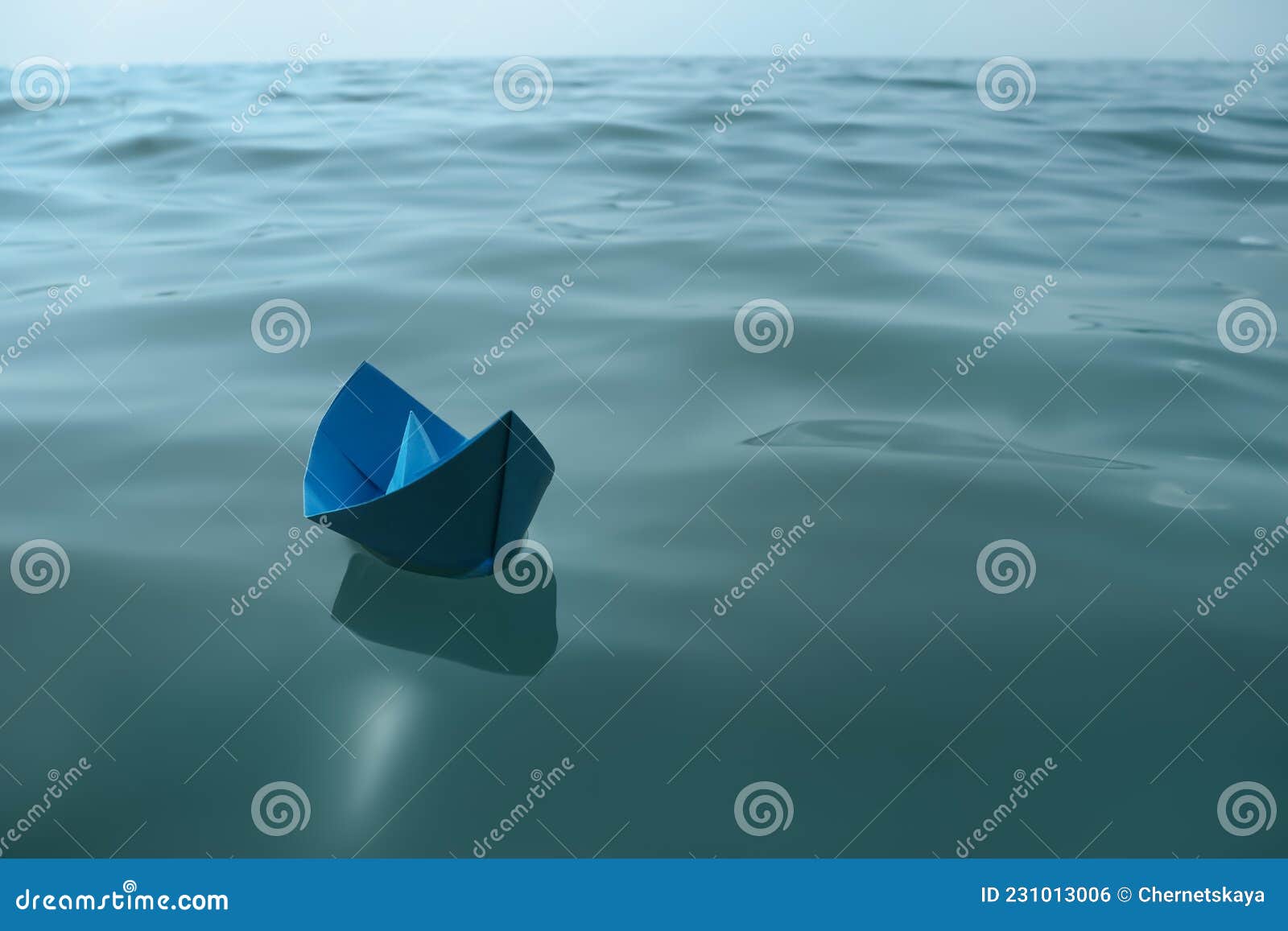 Light Blue Paper Boat Floating on Water Surface, Space for Text Stock ...