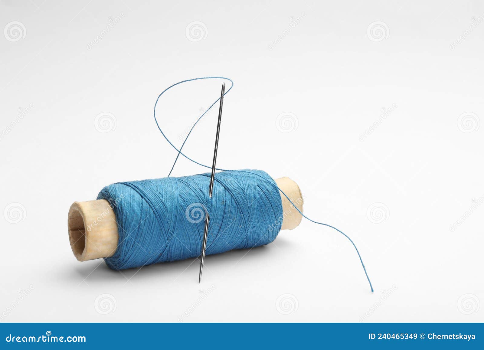 Light Blue Sewing Thread with Needle on White Background Stock Image ...