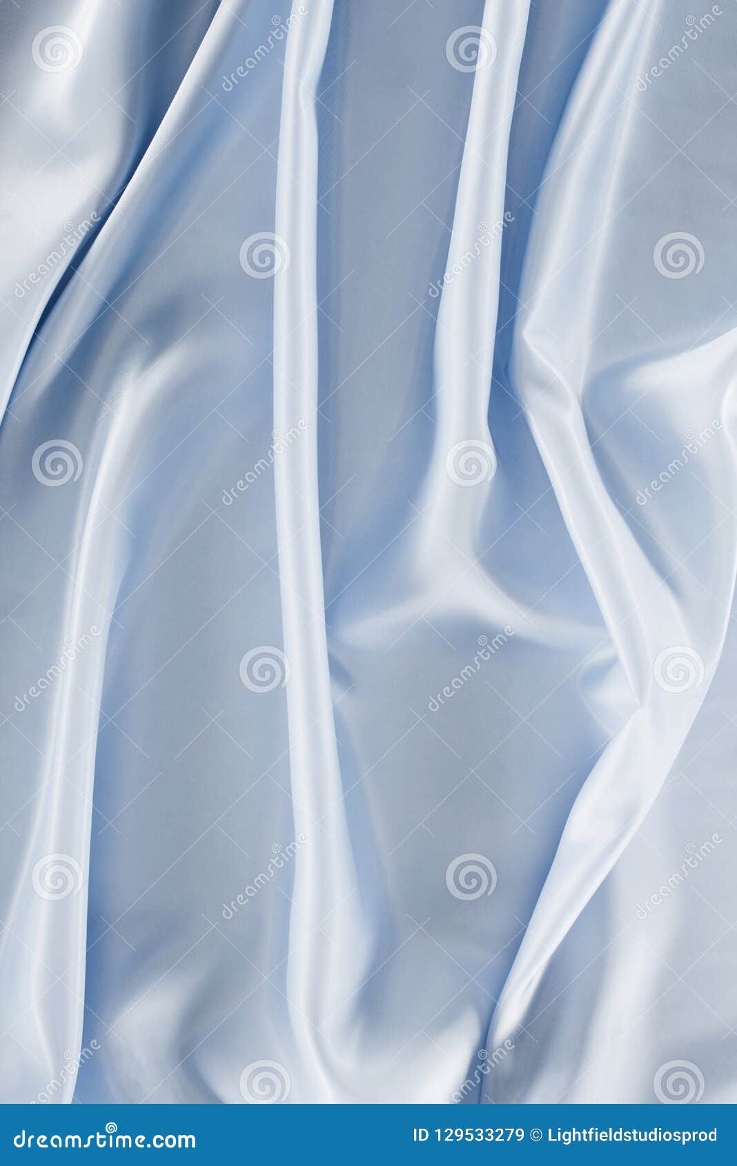Light blue shiny satin stock image. Image of background - 129533279