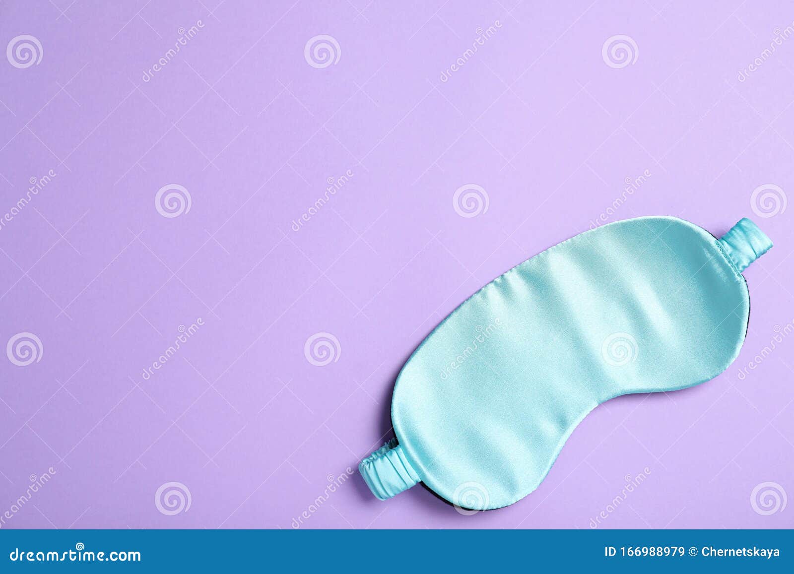 Light Blue Sleeping Mask on Violet Background, Top View. Bedtime ...