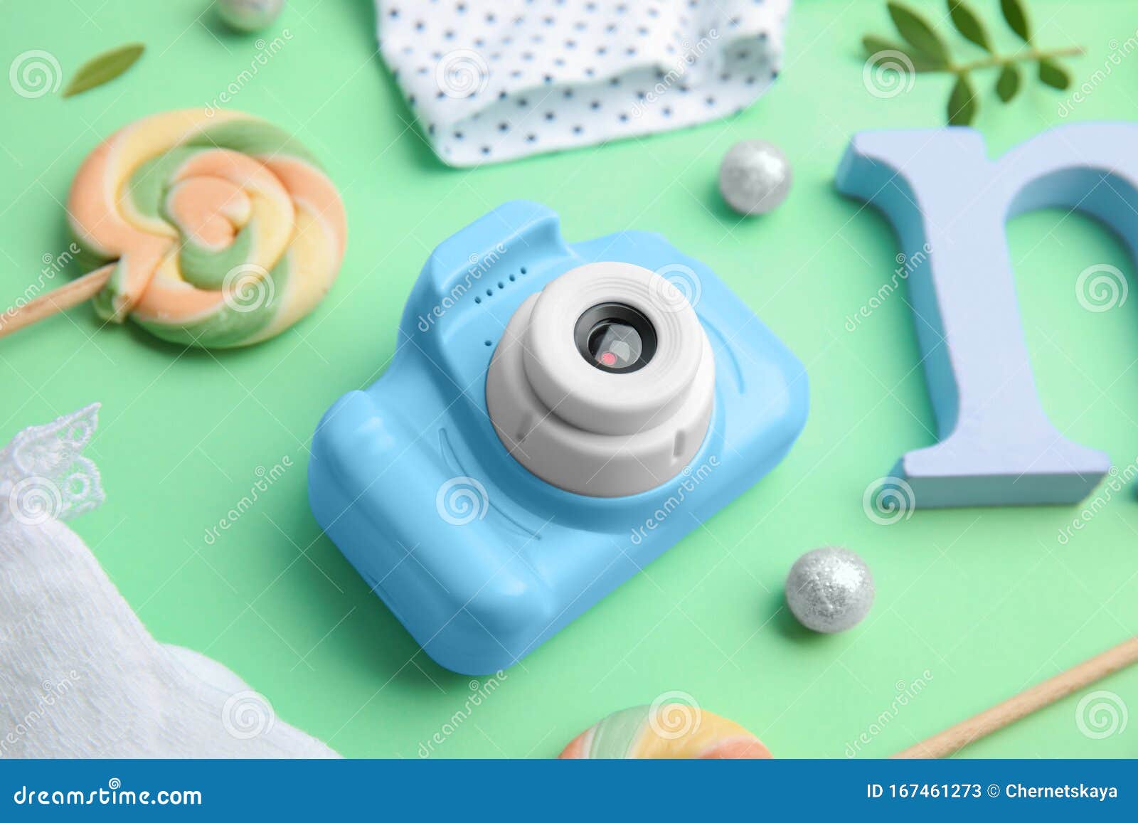 Light Blue Toy Camera on Light Green. Future Photographer Stock Image ...