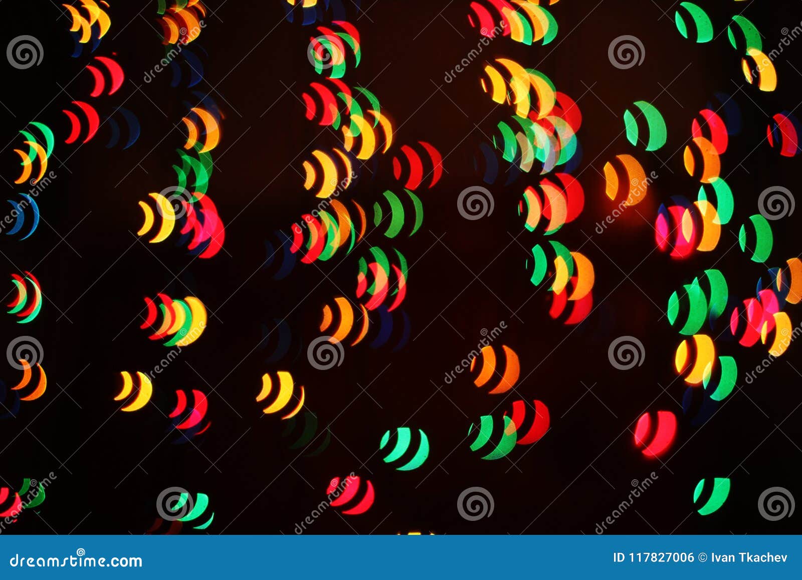 A Light Bokeh Pattern of Geometric Elements on a Dark Background Stock ...