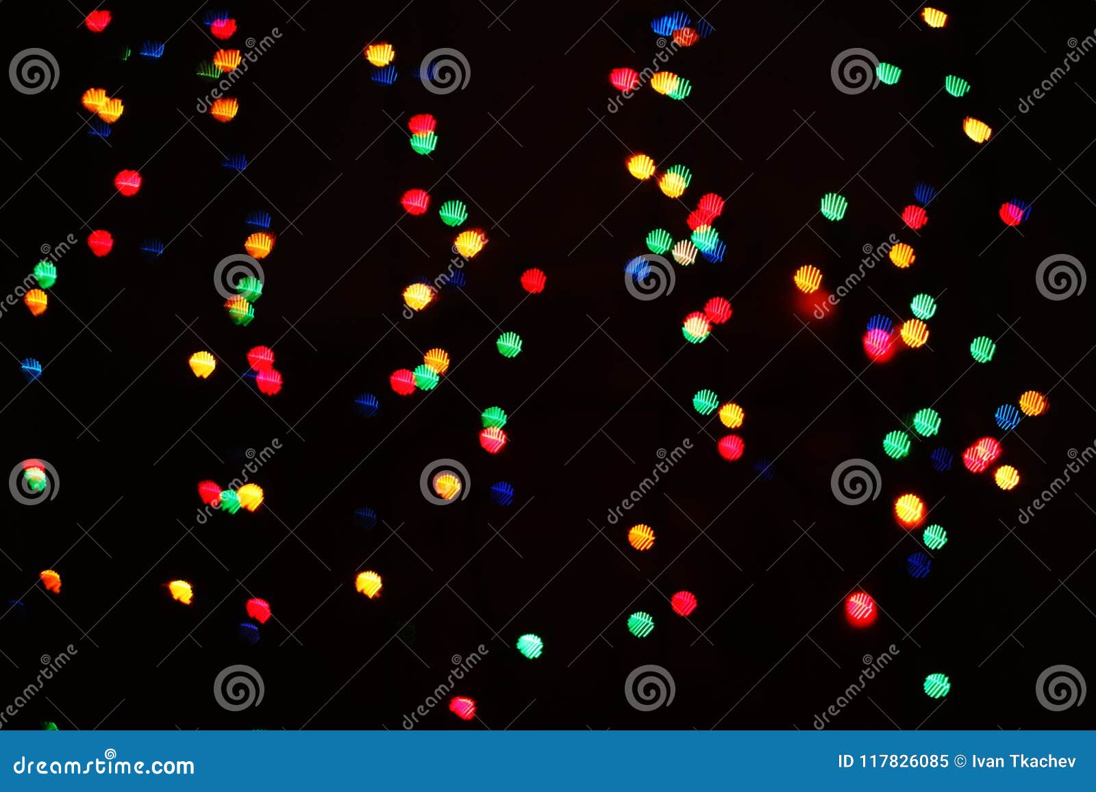 A Light Bokeh Pattern of Geometric Elements on a Dark Background Stock ...
