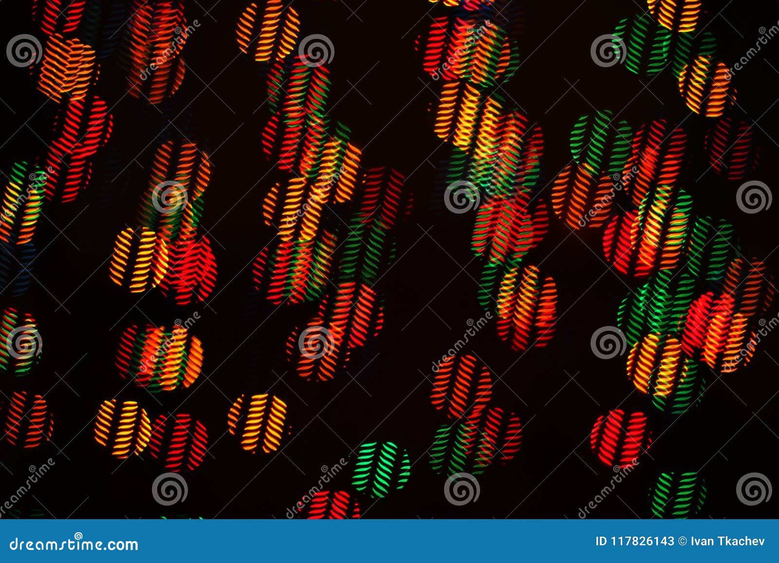 A Light Bokeh Pattern of Geometric Elements on a Dark Background Stock ...