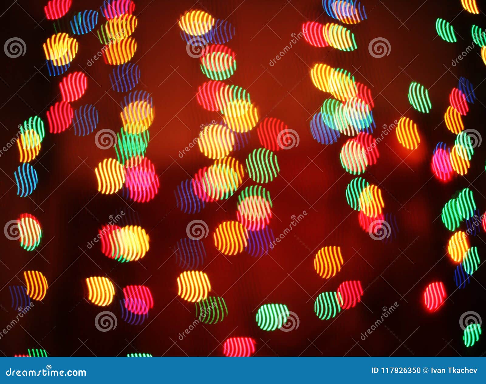 A Light Bokeh Pattern of Geometric Elements on a Dark Background Stock ...