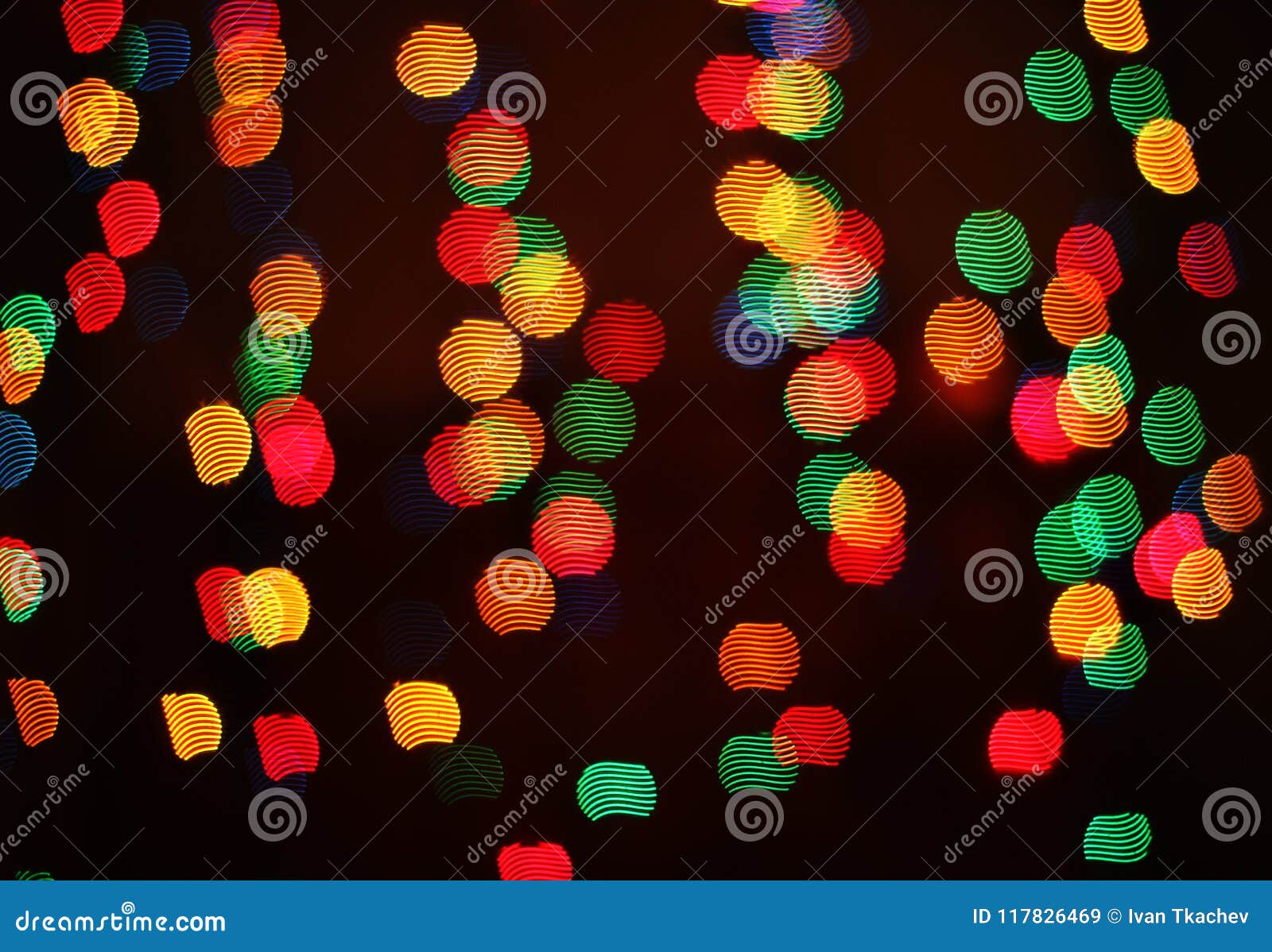 A Light Bokeh Pattern of Geometric Elements on a Dark Background Stock ...