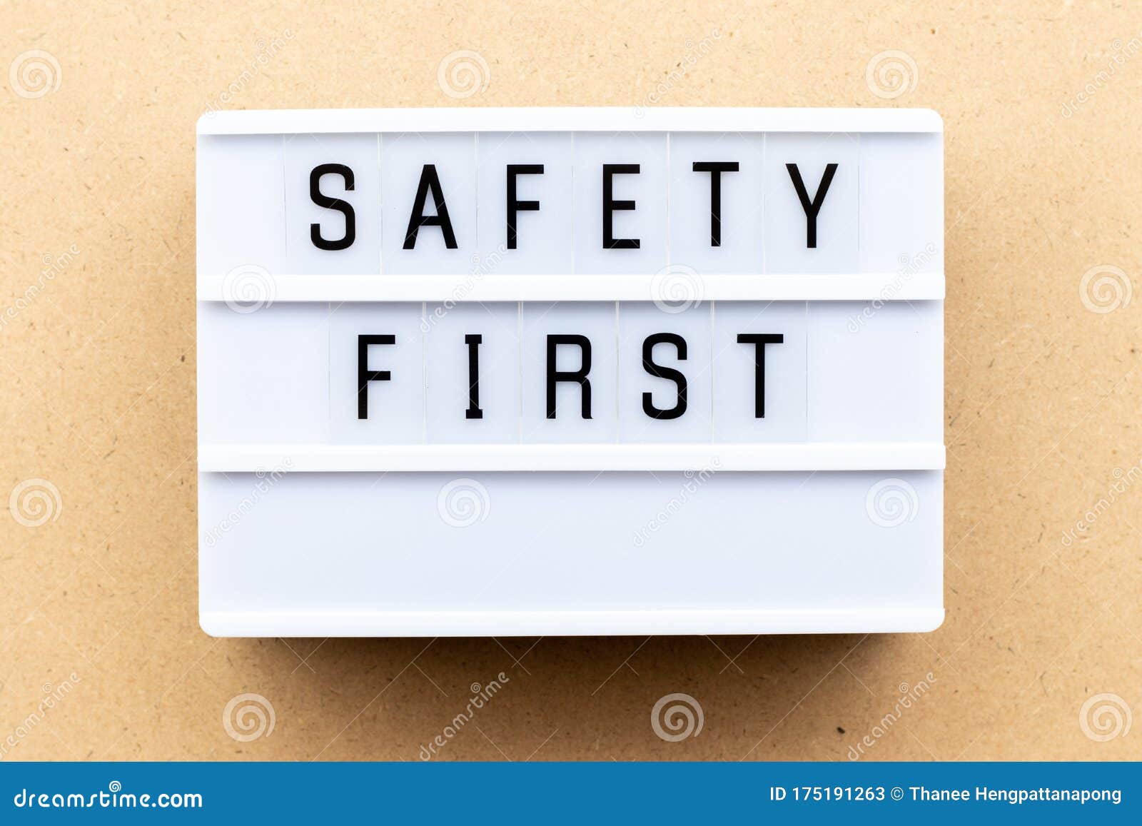 Light Box with Word Safety First on Wood Background Stock Image - Image ...