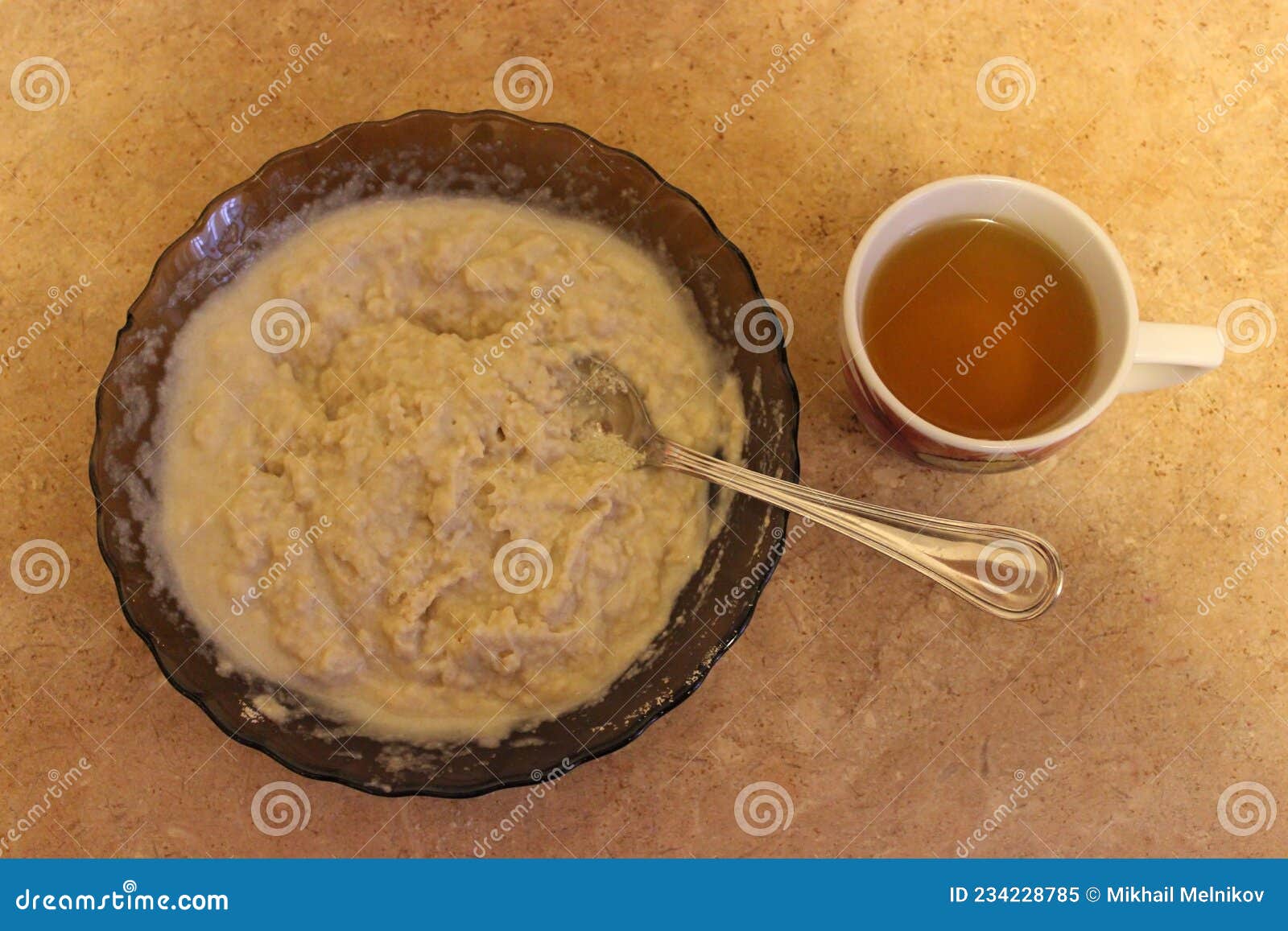 A Plate of Porridge and a Cup of Tea Stock Image - Image of buttercream ...