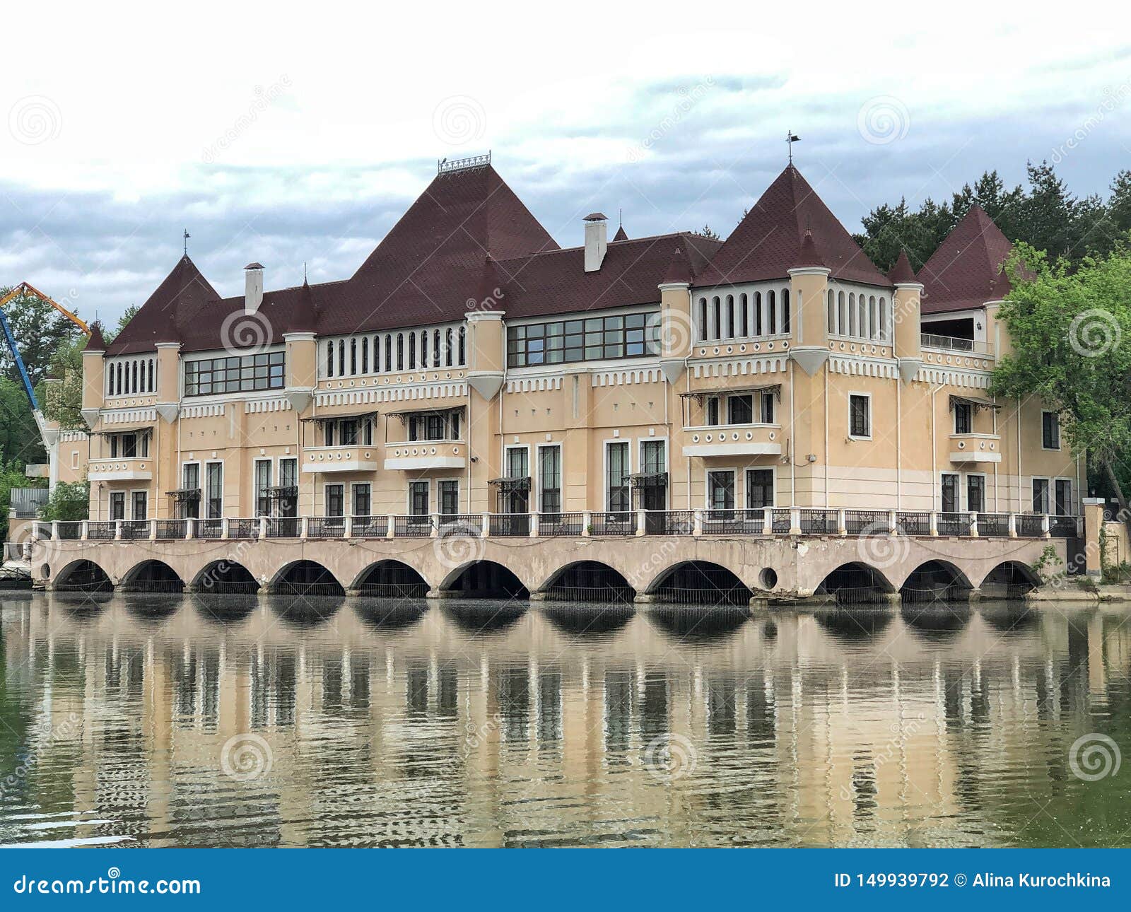 A Light Brown Building Near the Water Stock Photo - Image of ...
