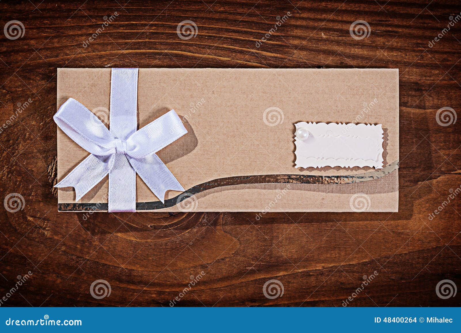 Light Brown Wedding Invitation Envelope on Old Wooden Board Stock Photo ...