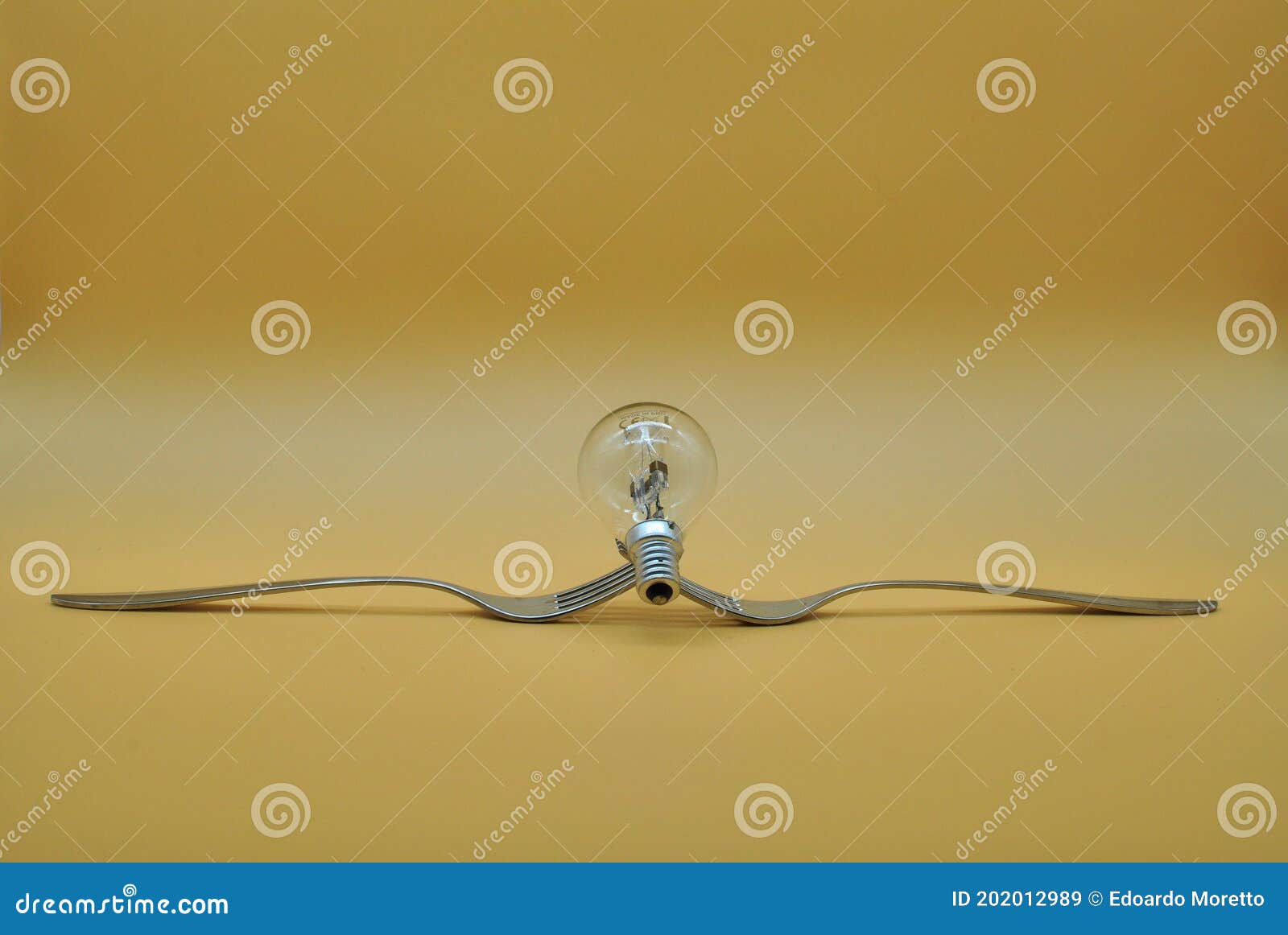 Light Bulb Balancing on a Composition of 2 Intertwined Forks Isolated ...