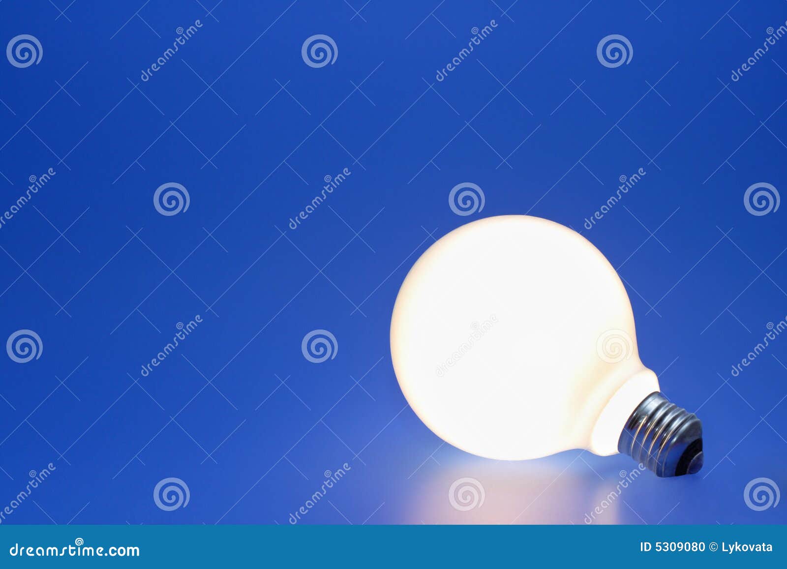 Light bulb on a blue stock photo. Image of glowing, glass - 5309080
