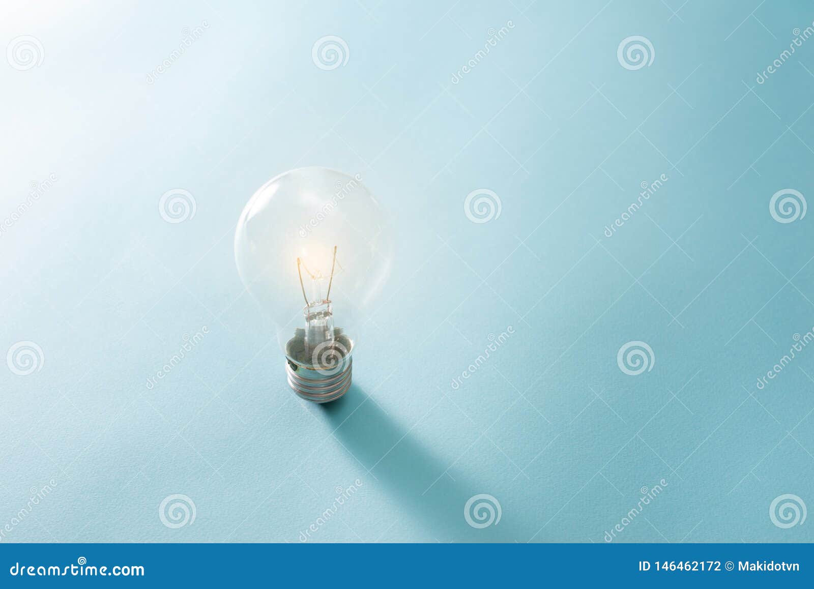 Light Bulb on Blue Background Stock Photo - Image of technology, design ...