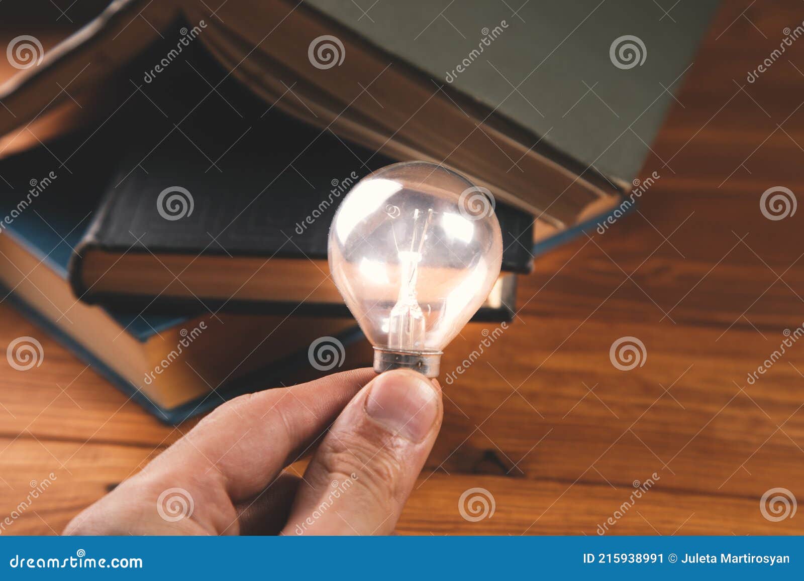 Light Bulb and Book on the Table Stock Image - Image of business ...