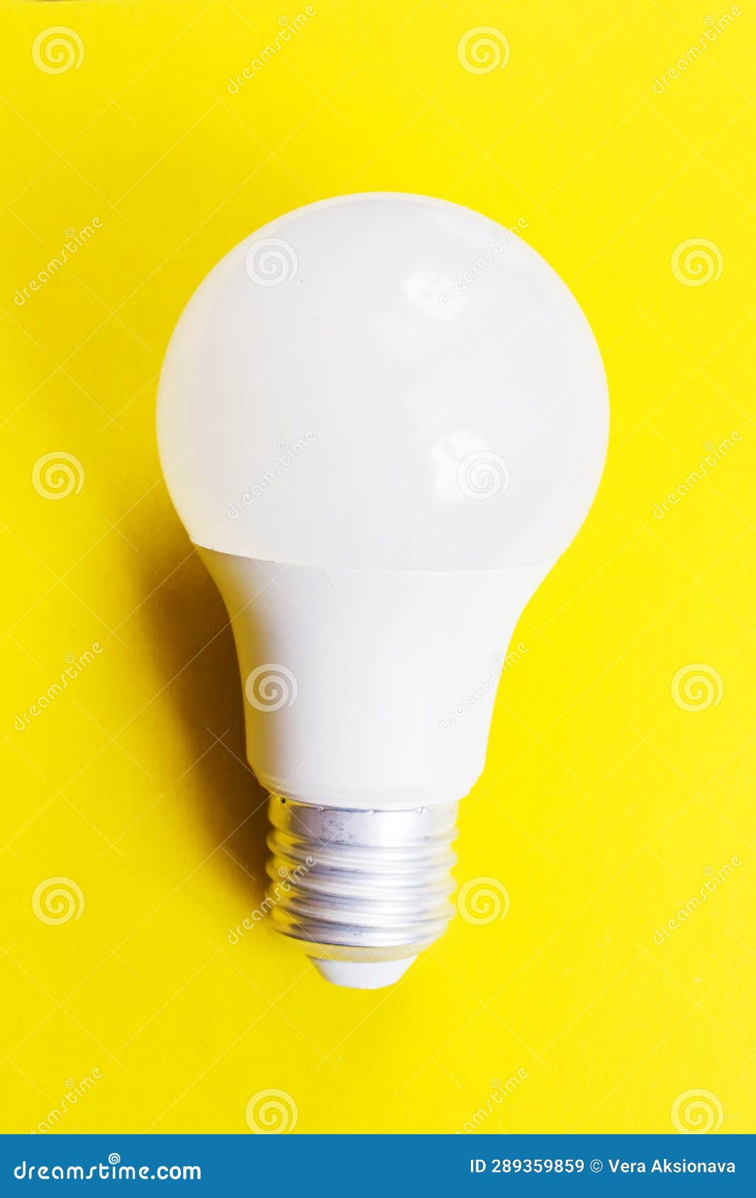 Light Bulb on Bright Yellow Background Closeup Stock Image - Image of ...