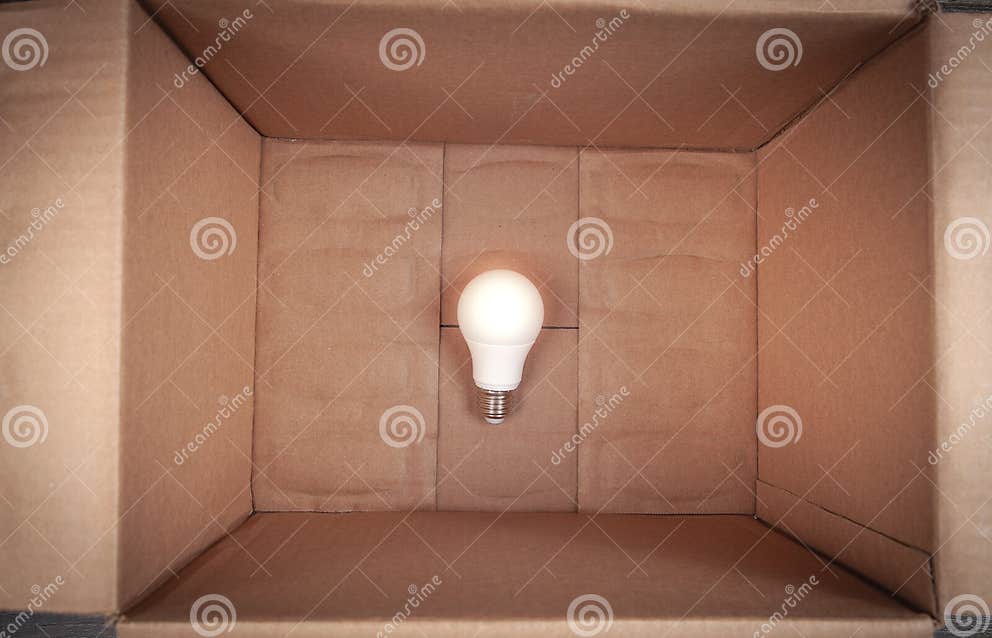 Light Bulb in the Cardboard Box Stock Photo - Image of cardboard ...