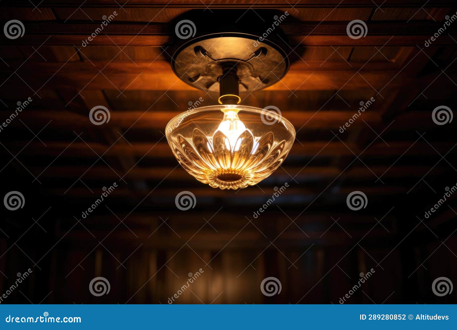 Light Bulb in a Ceiling Fixture, Turned on Stock Photo - Image of ...