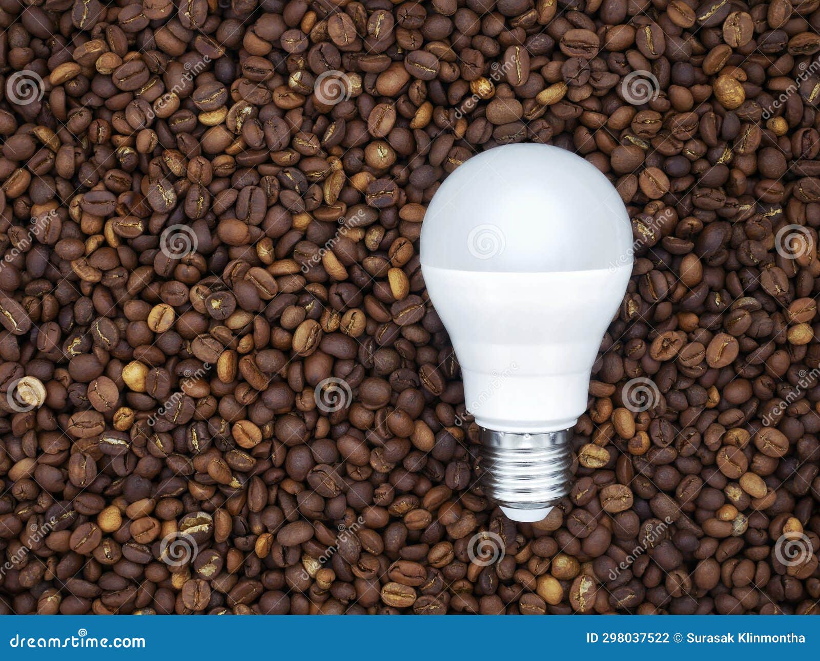 Light Bulb on Coffee Beans Texture Background.Top View Stock Photo ...