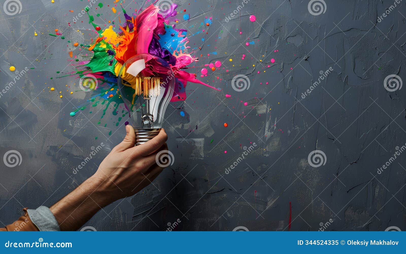 Light Bulb with Colour Paint Splash in Man S Hand on Grey Background ...