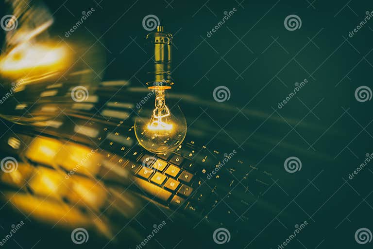 Light Bulb and Computer Keyboard Stock Photo - Image of keyboard ...