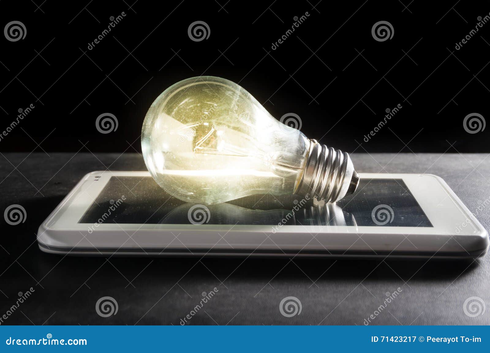 Light Bulb on Computer Tablet. Stock Image - Image of diary, bulb: 71423217
