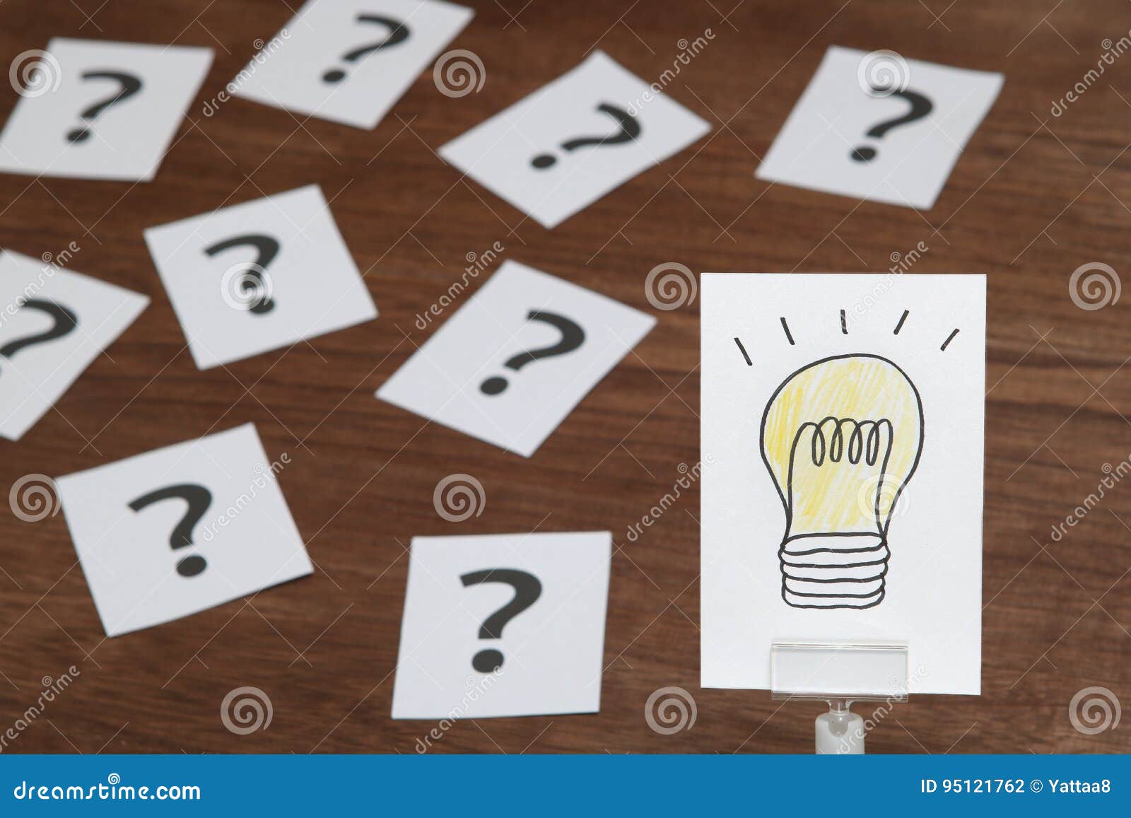 Light Bulb Drawn on White Paper with Many Question Marks. Solution ...