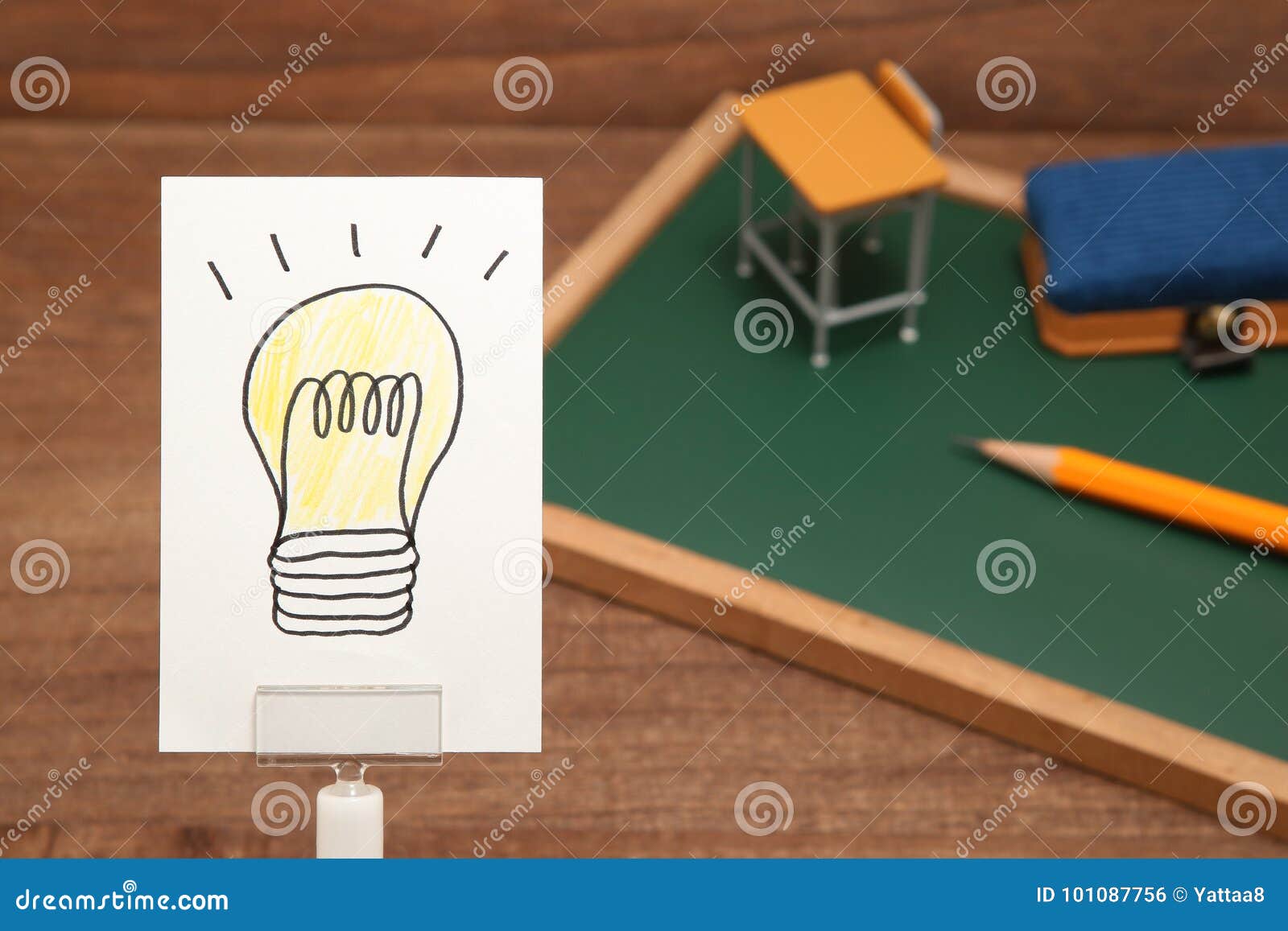 Light Bulb Drawn on White Paper with the Study Tools As the Background ...