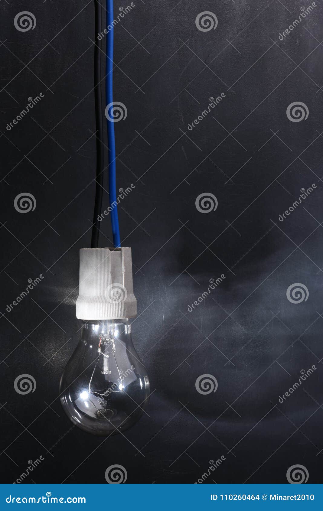 Light Bulb on Electric Cable Stock Photo - Image of lightbulb, material ...