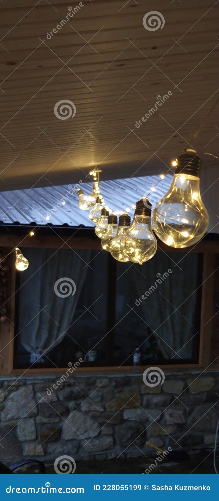 Light bulb in the evening stock image. Image of lamp - 228055199