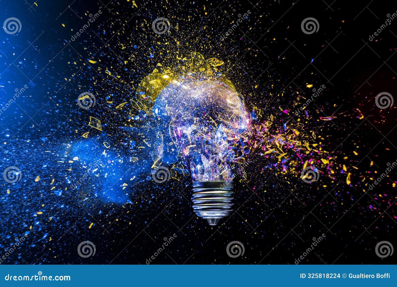 Light Bulb Exploding in Colorful Powder on Black Background Stock Photo ...