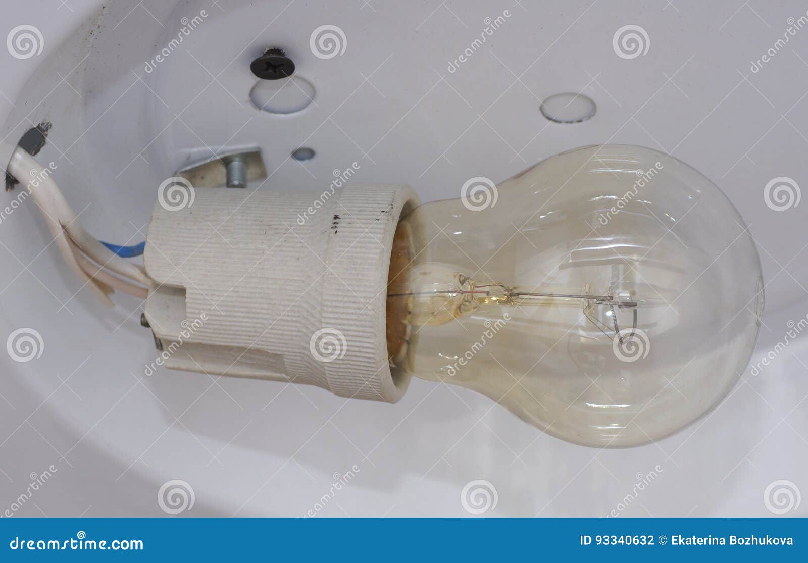 A Light Bulb in the Fixture. Stock Photo - Image of household, interior ...