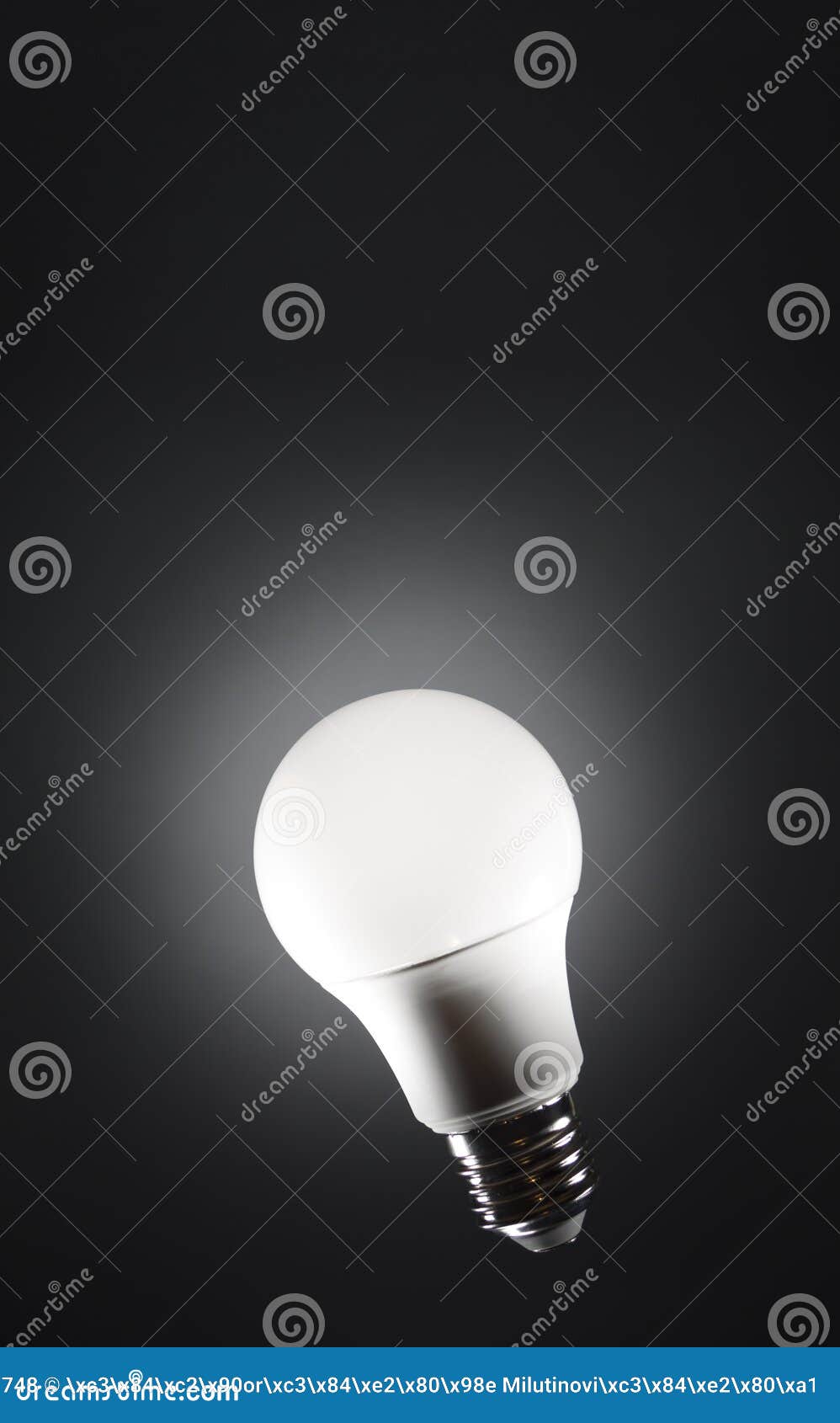 Light Bulb Floating in Dark Empty Black Space and Shining. Power Saving ...