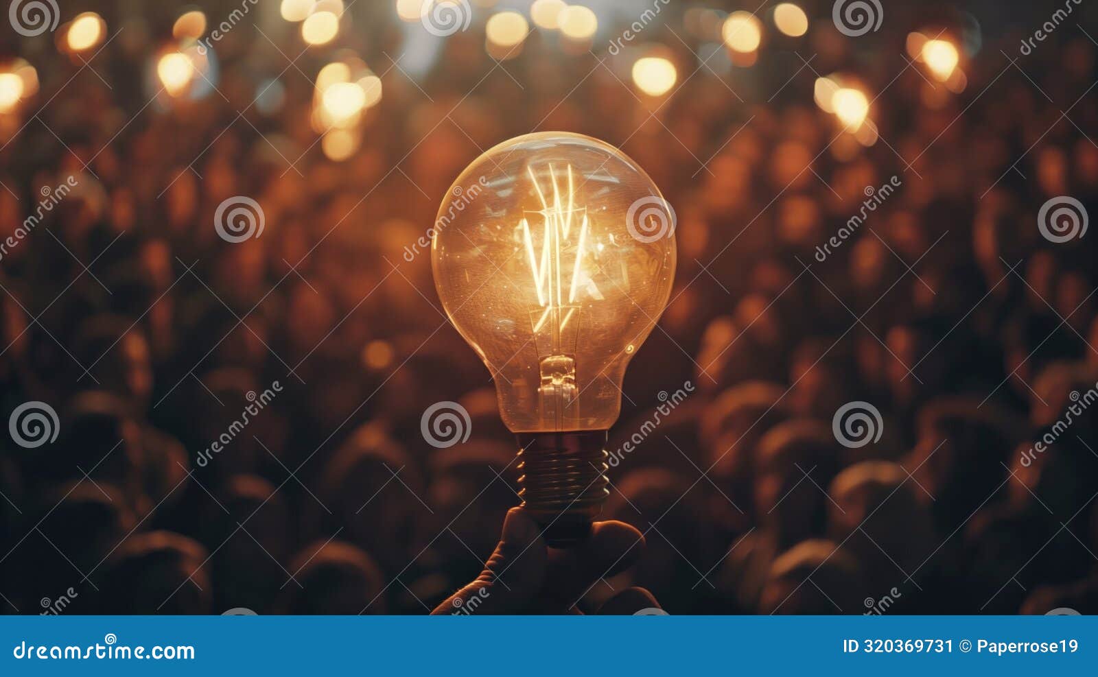 A Light Bulb in Front of a Crowd of People Stock Image - Image of ...