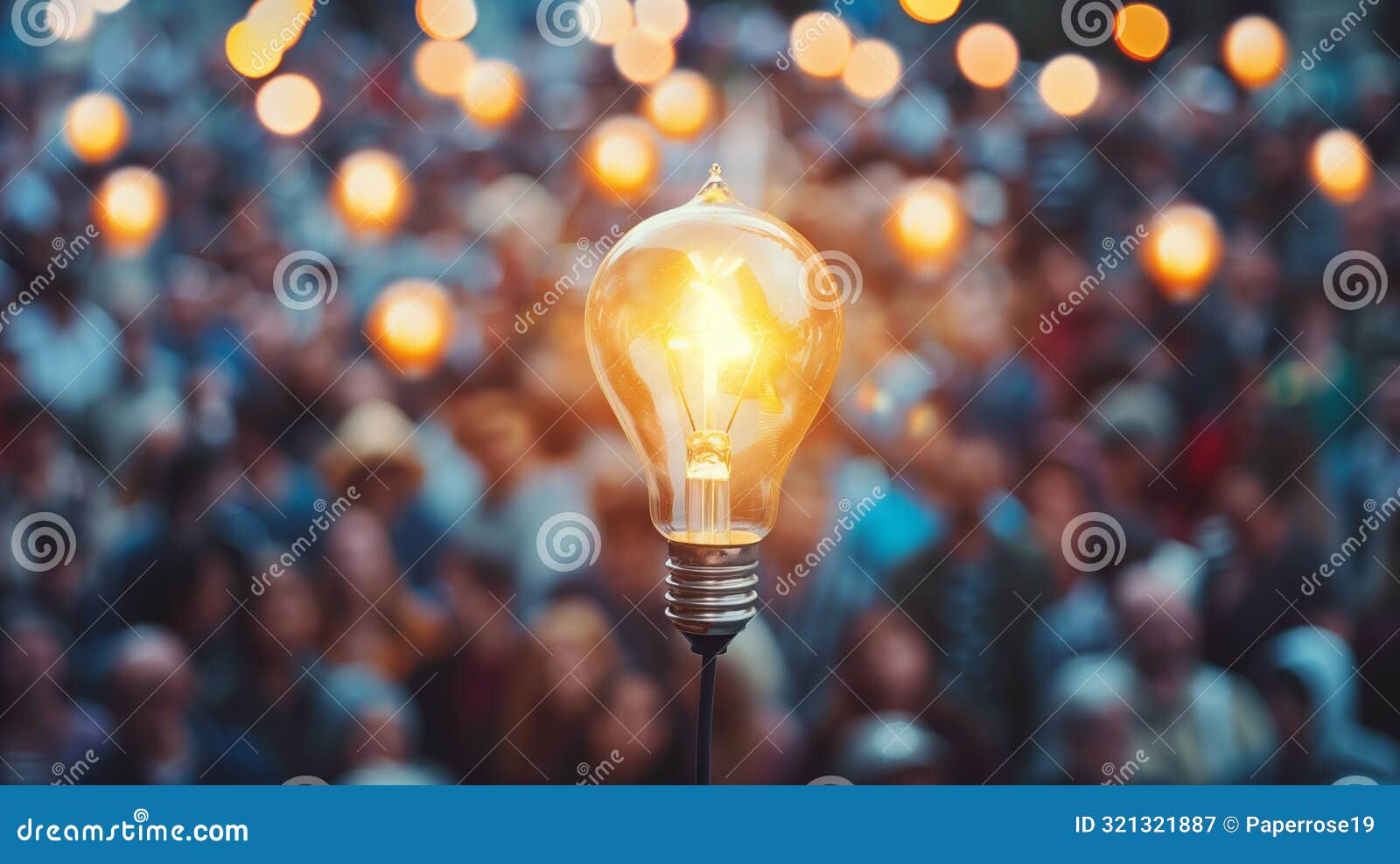 A Light Bulb in Front of a Crowd of People Stock Image - Image of ...