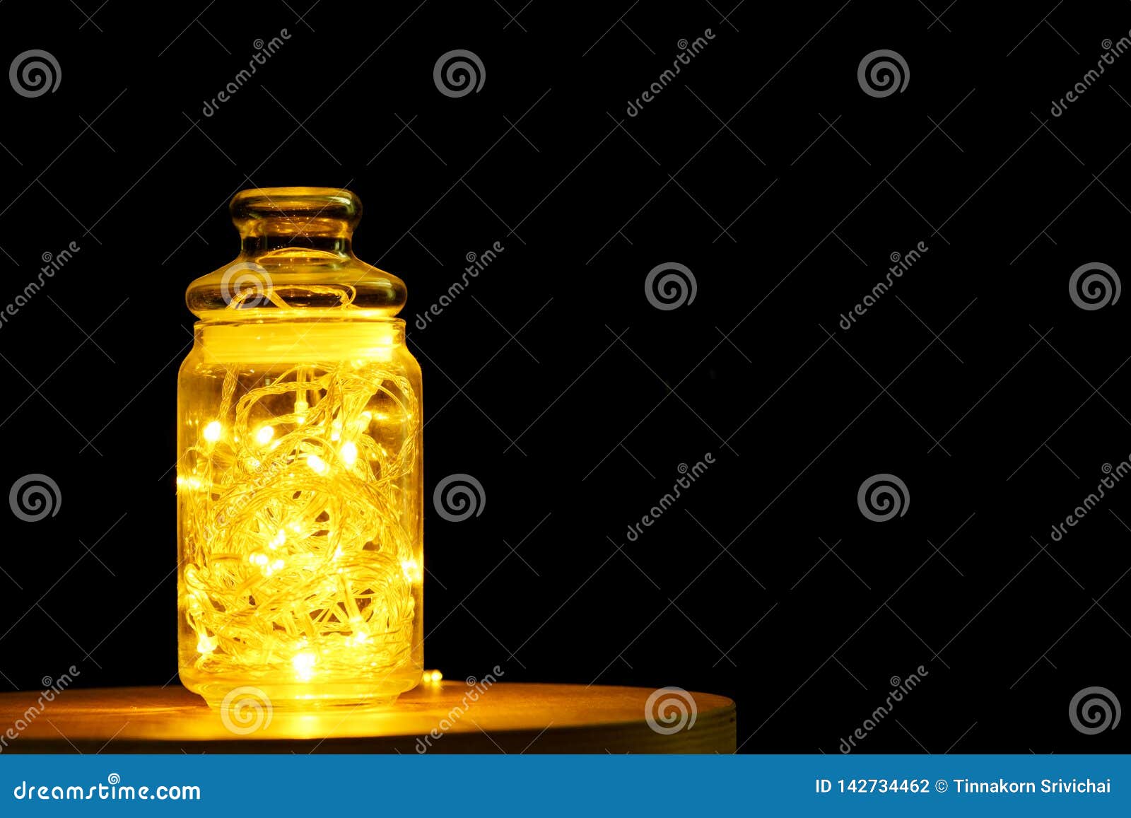 Light Bulb in Glass Container Stock Photo - Image of black, year: 142734462