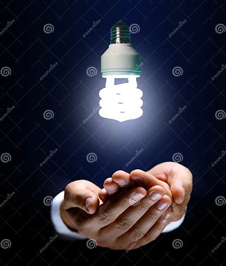 Light bulb and hand stock image. Image of incandescent - 18170269