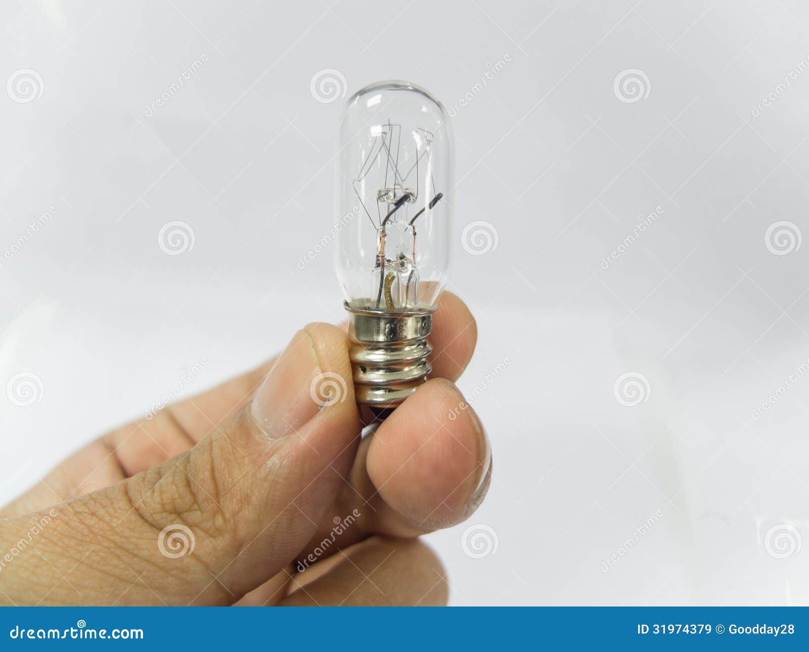 Light bulb in hand stock image. Image of contemplation - 31974379
