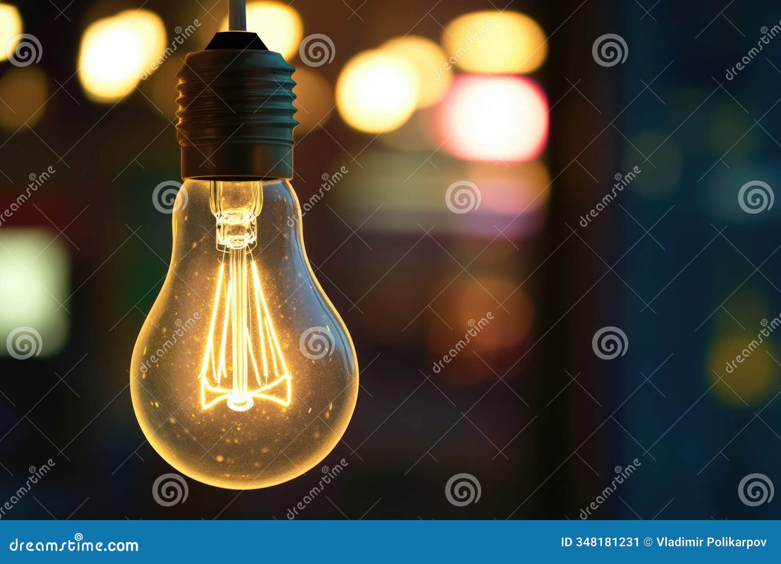 A Light Bulb Hanging from a Ceiling in a Dark Room, Potential Scene for ...