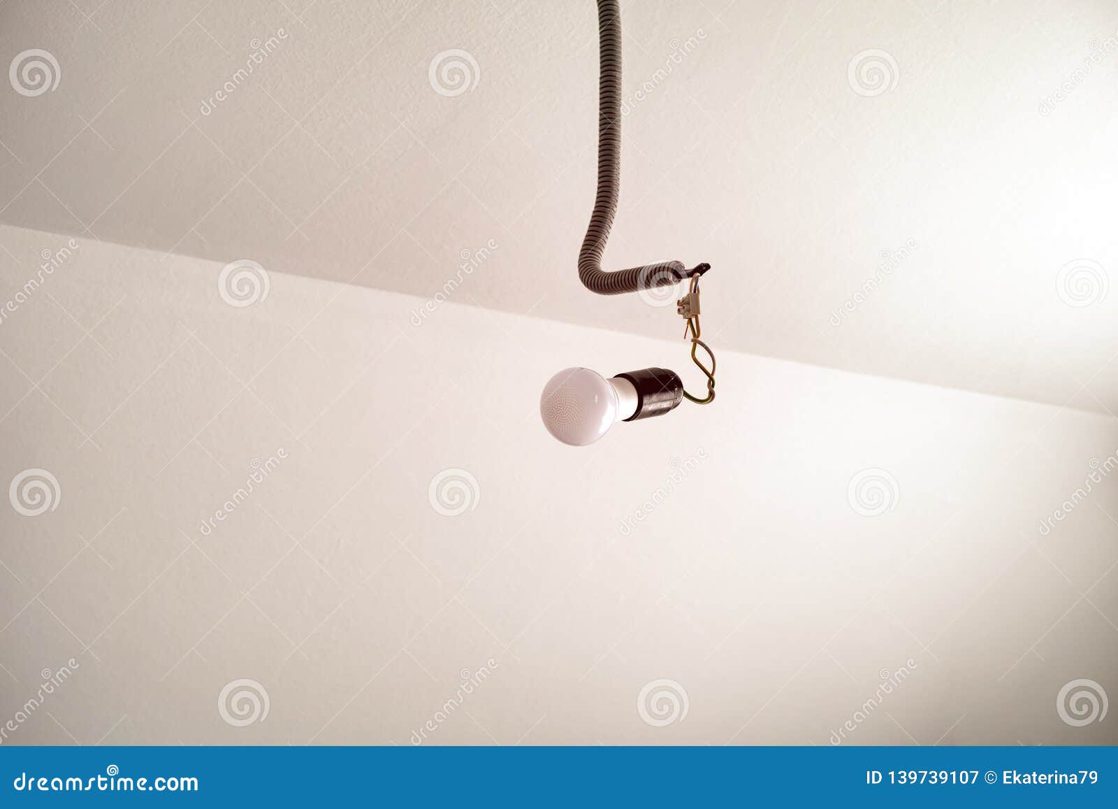 Light Bulb Hanging on the Wire on the Ceiling Stock Image - Image of ...